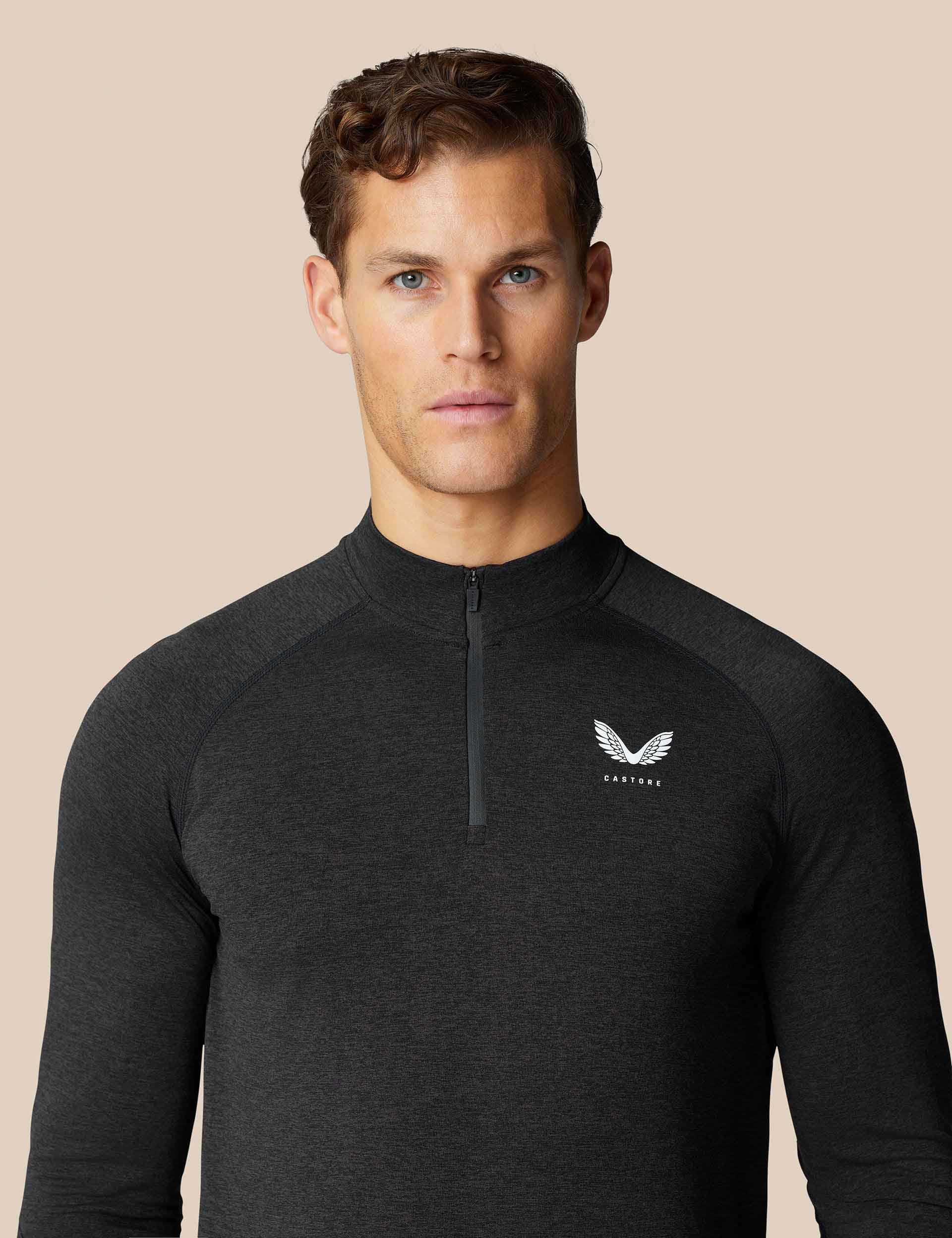 Castore | Seamless 1/4 Zip Long Sleeve Top - Black | The Sports Edit