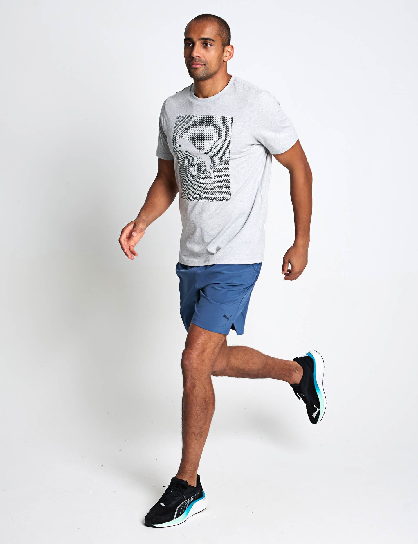 Puma | Tech Training 7" Stretch Woven Short - Indigo | The Sports Edit