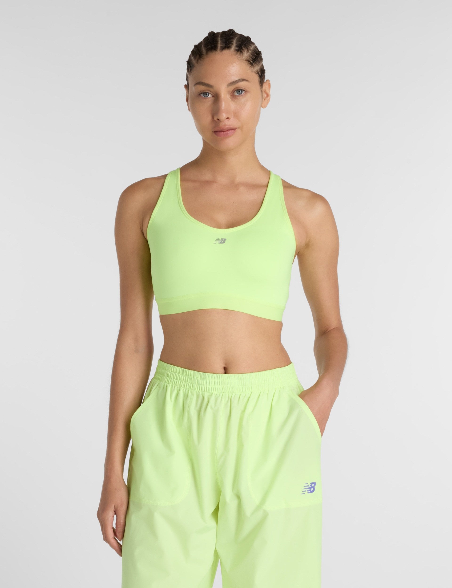 New Balance | NB Essential Run Bra - Afterglow | The Sports Edit